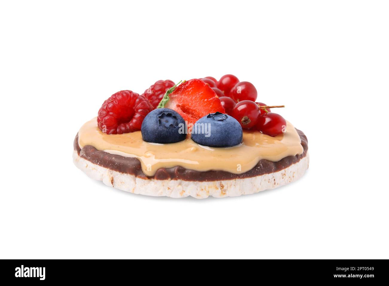 Crunchy rice cake with peanut butter and sweet berries isolated on ...