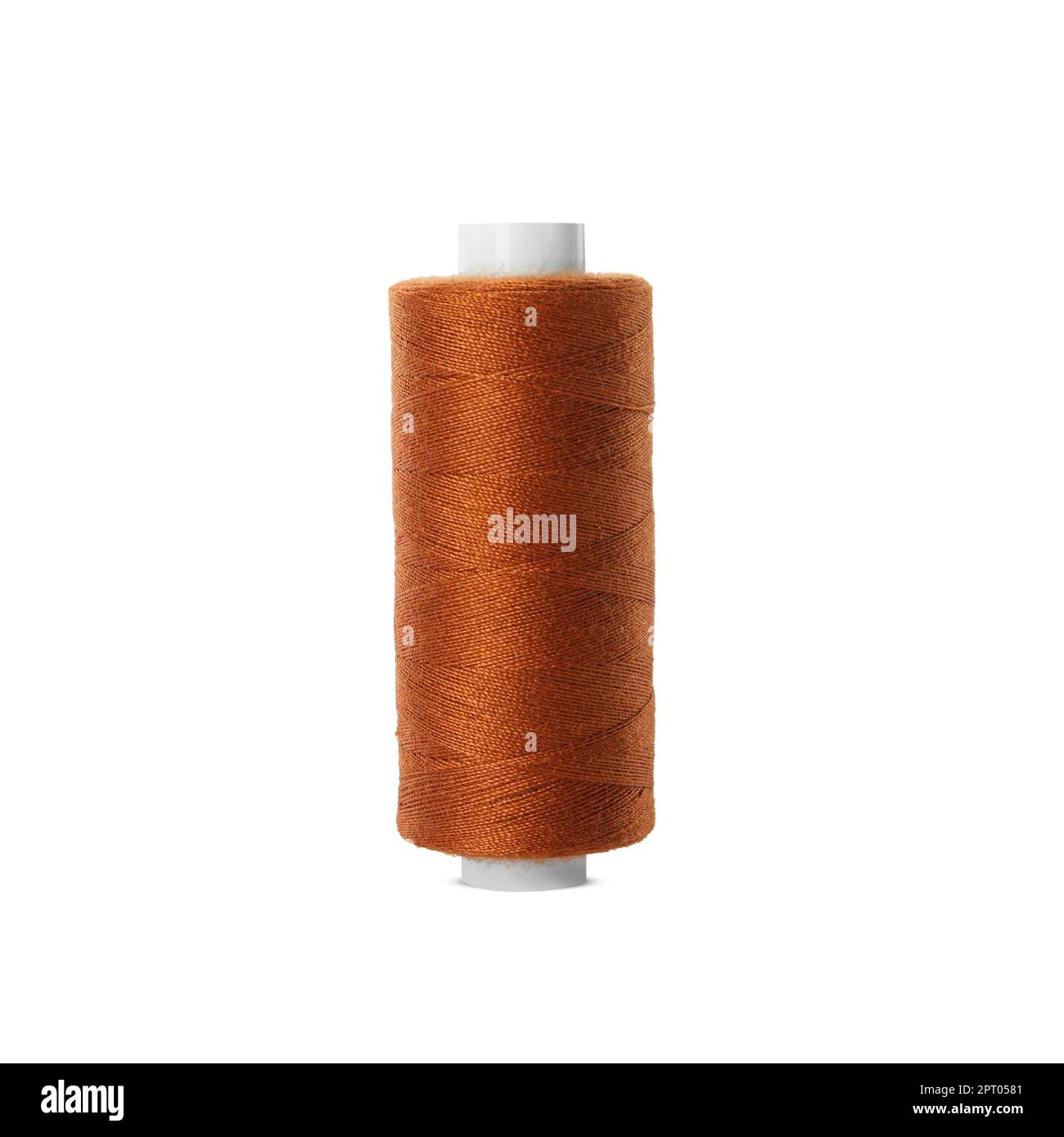Spool of brown sewing thread isolated on white Stock Photo - Alamy
