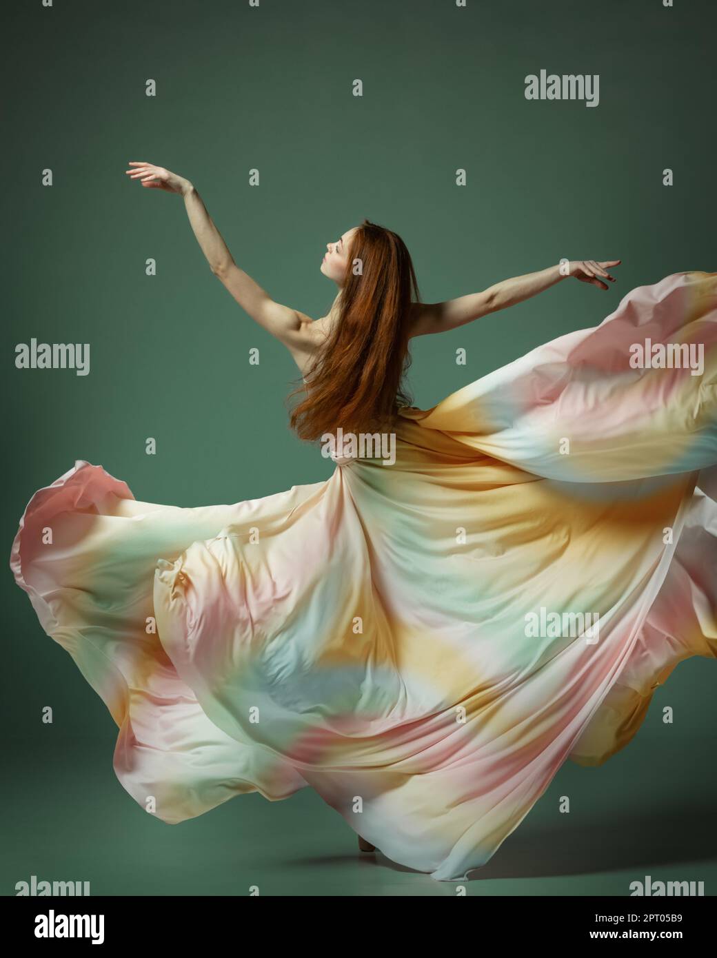 One young gorgeous ballerina, young girl dancing gracefully with with ...