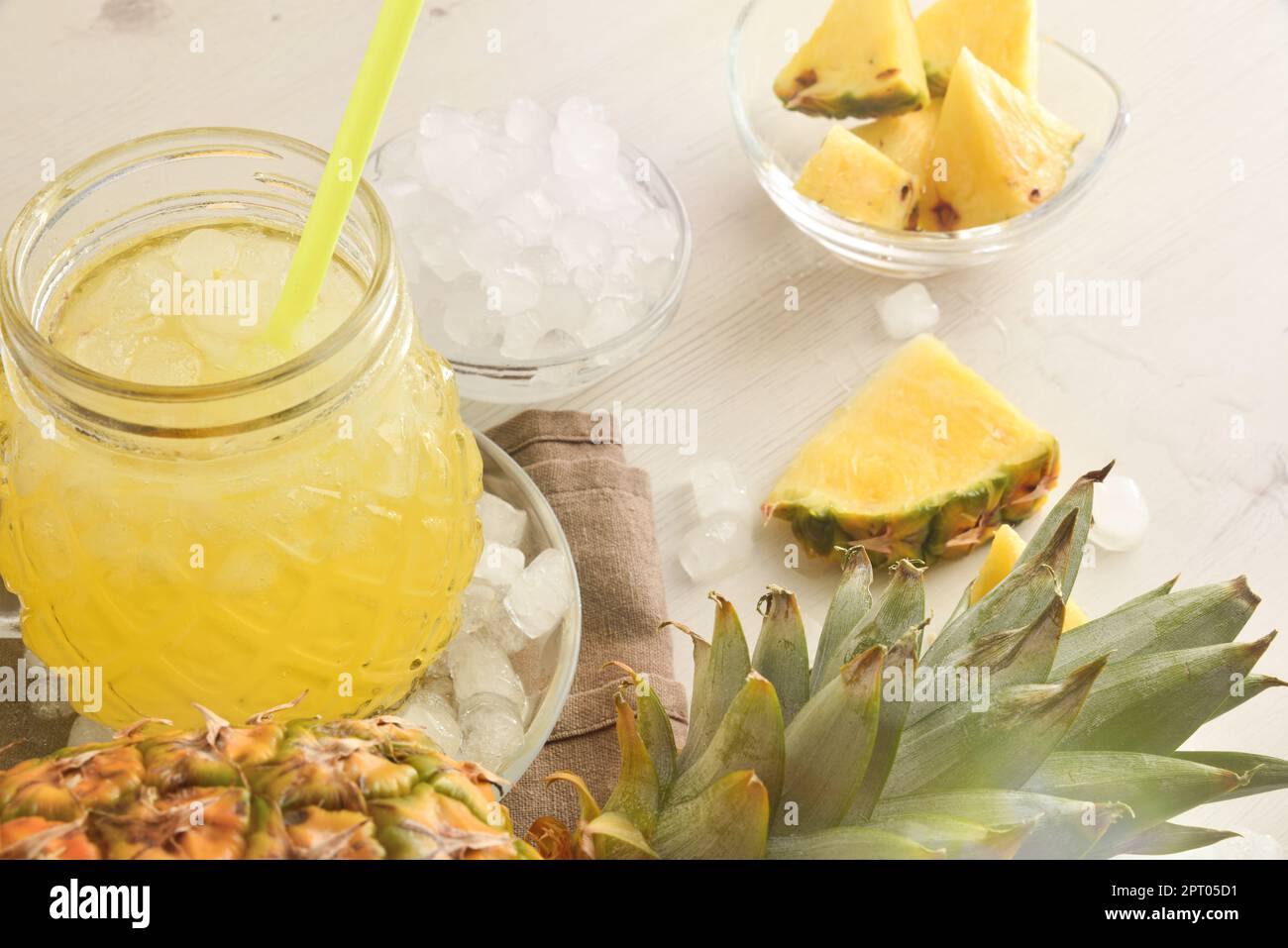 Detail of freshly made pineapple slush with fruit and crushed ice ...