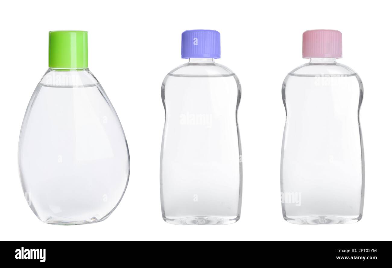 Set with bottles of baby oils on white background Stock Photo - Alamy