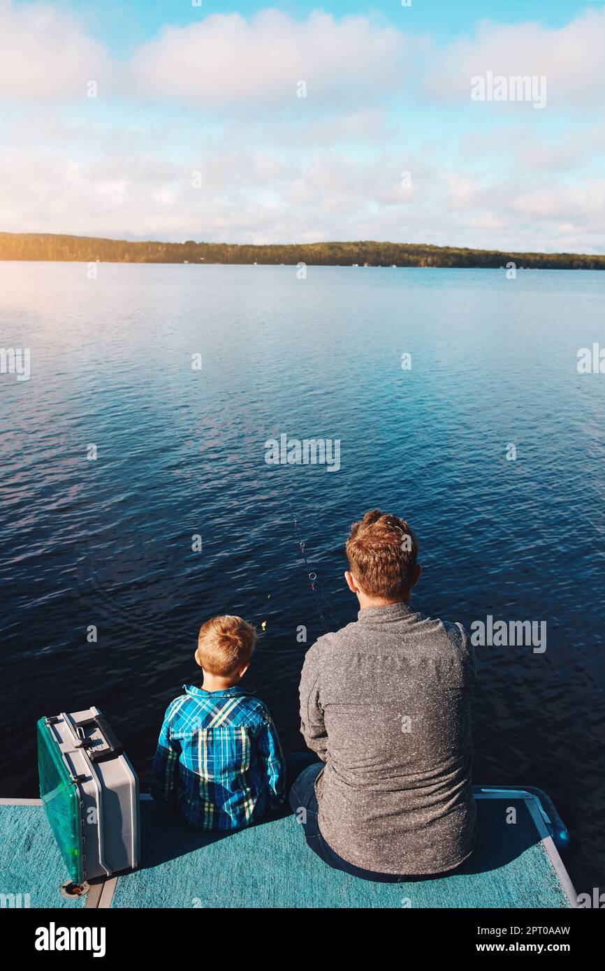 Theres no better way to teach patience. a father and his young son out ...