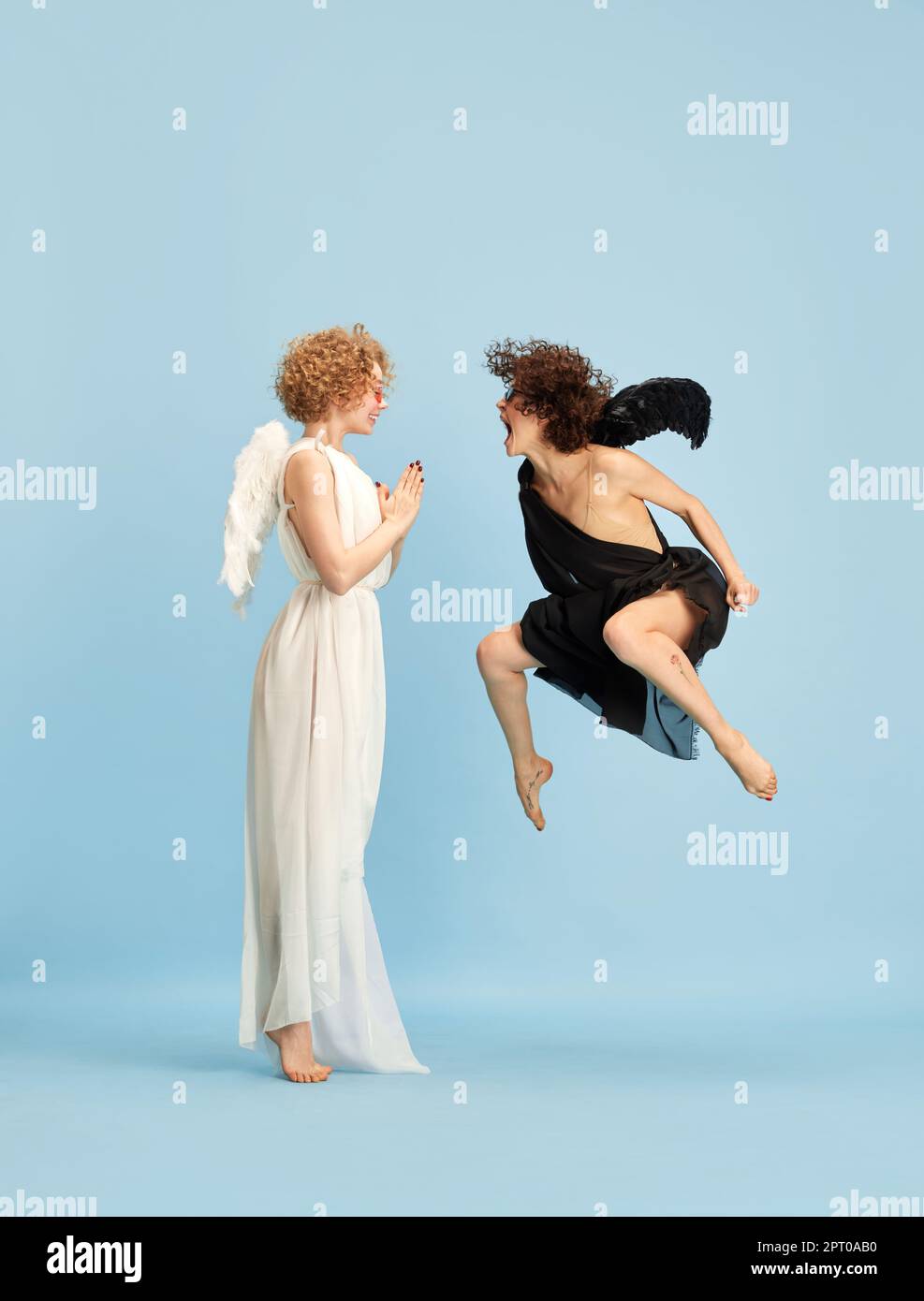 Kindness and anger. Cte, tender girl in image of angel and emotional ...