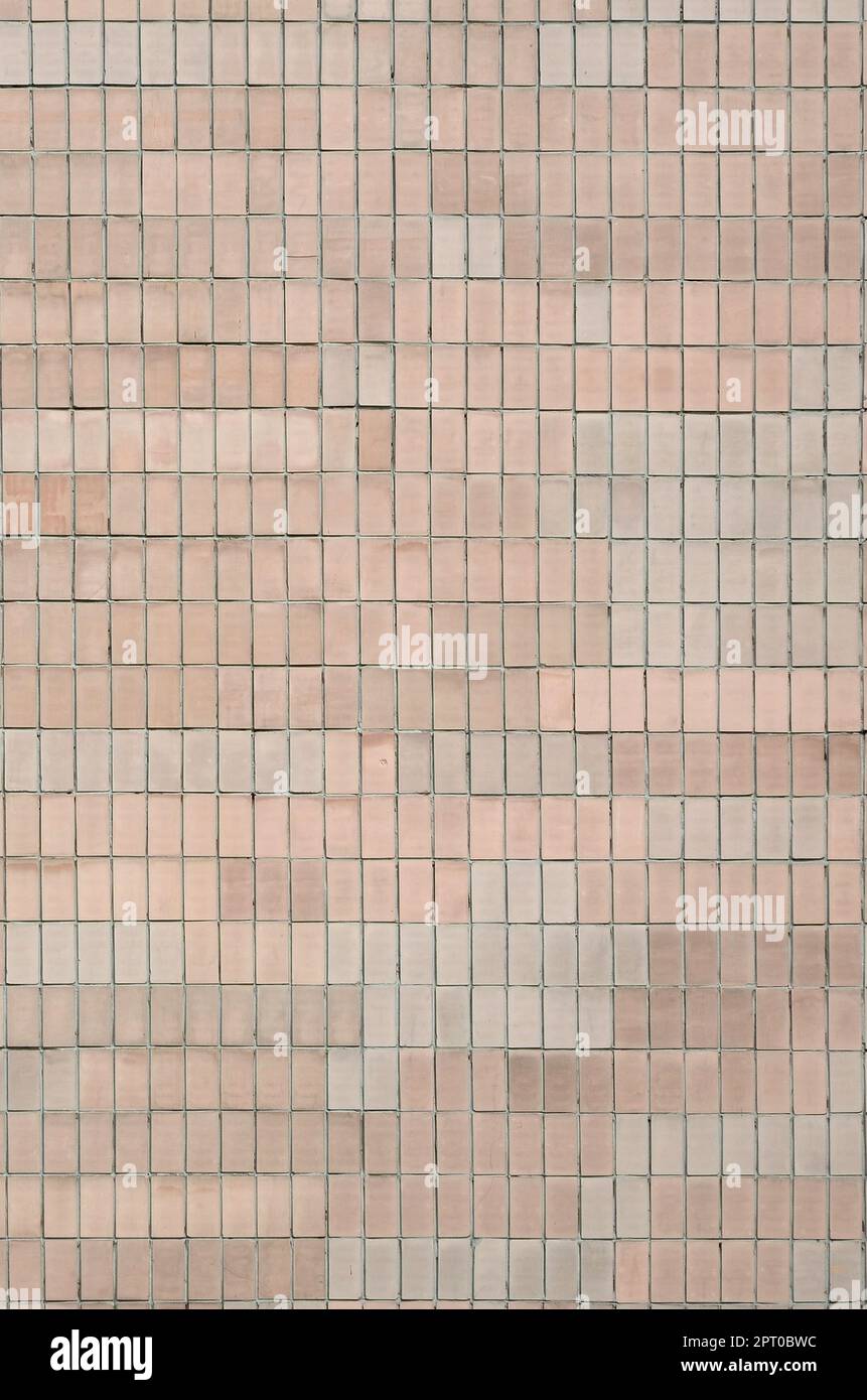 Old Soviet beige wall tiles. The texture of the classical outer tile ...