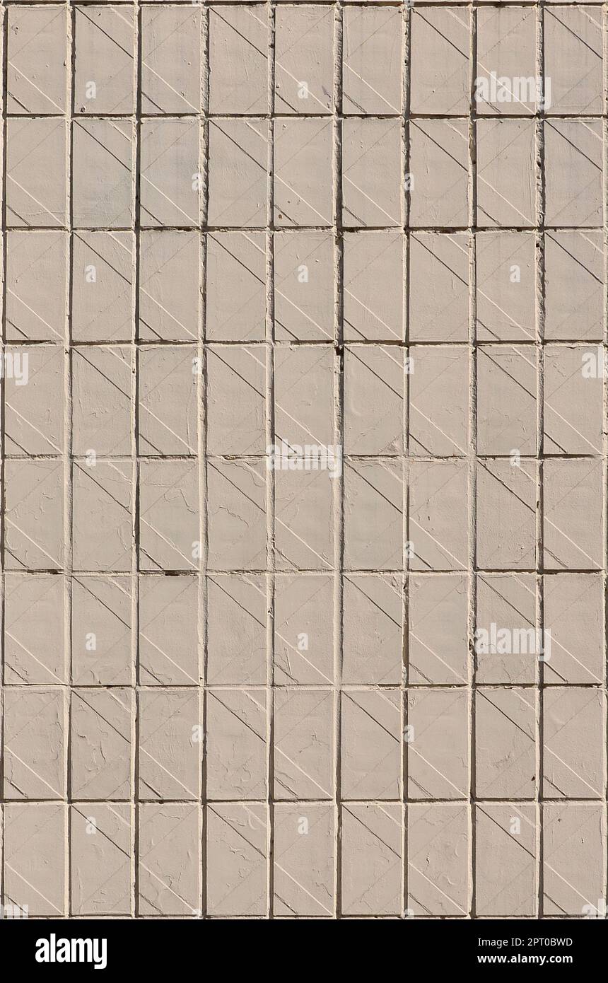 Old Soviet beige wall tiles. The texture of the classical outer tile ...