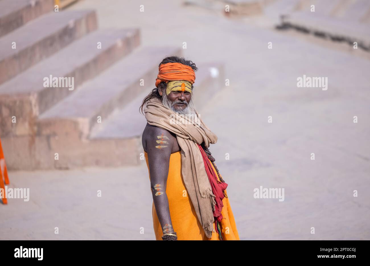 Portrait of Unidentified Indian sadhu baba walking on ghat near river ...