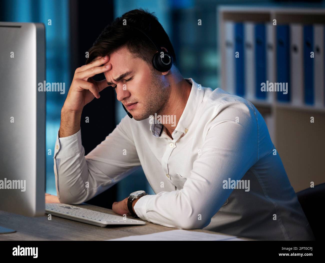 Stress, call center and customer service with a man consultant ...