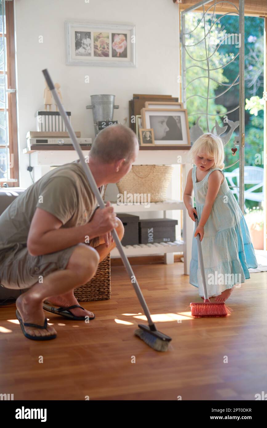 Children sweeping hi-res stock photography and images - Alamy