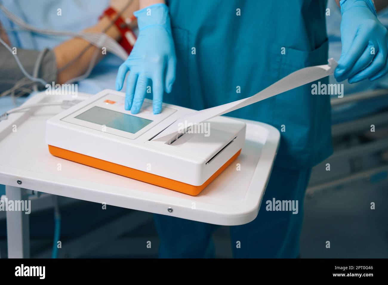 Medical worker works with a cardiograph in a diagnostic center Stock ...
