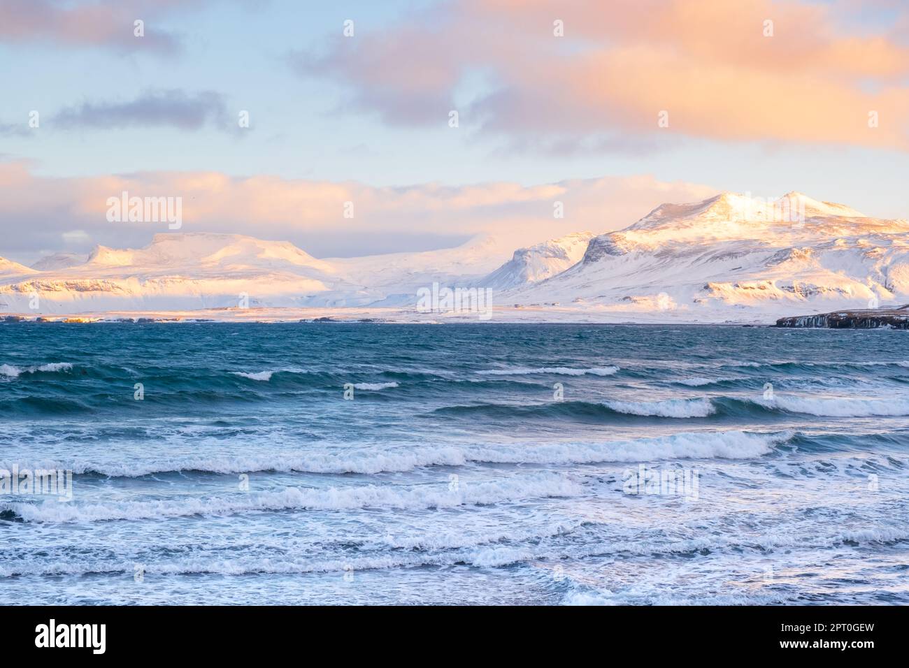 Sunrise Fluffy Clouds and Stormy Sea with Snowy Mountain in Iceland ...