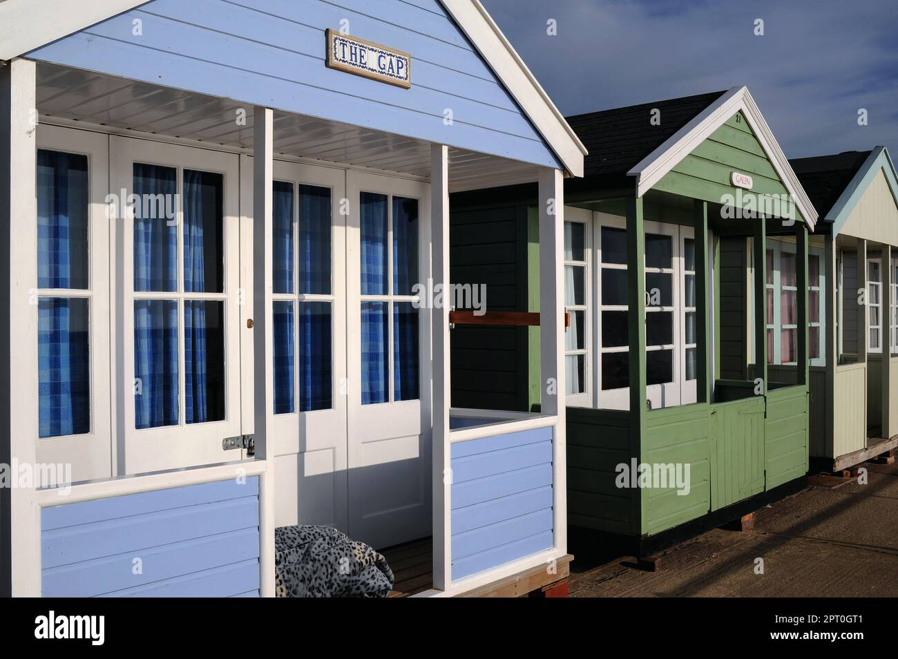 Iconic symbol of the traditional British seaside vacation, beach huts ...