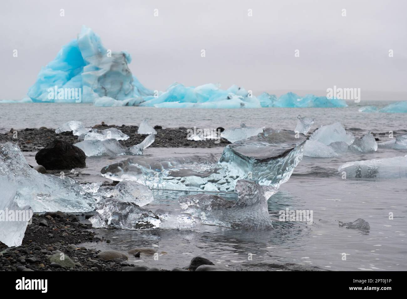 Blue Icebergs in Ocean Water. Glacier Ice Drift at Calm Water. Pure Ice ...