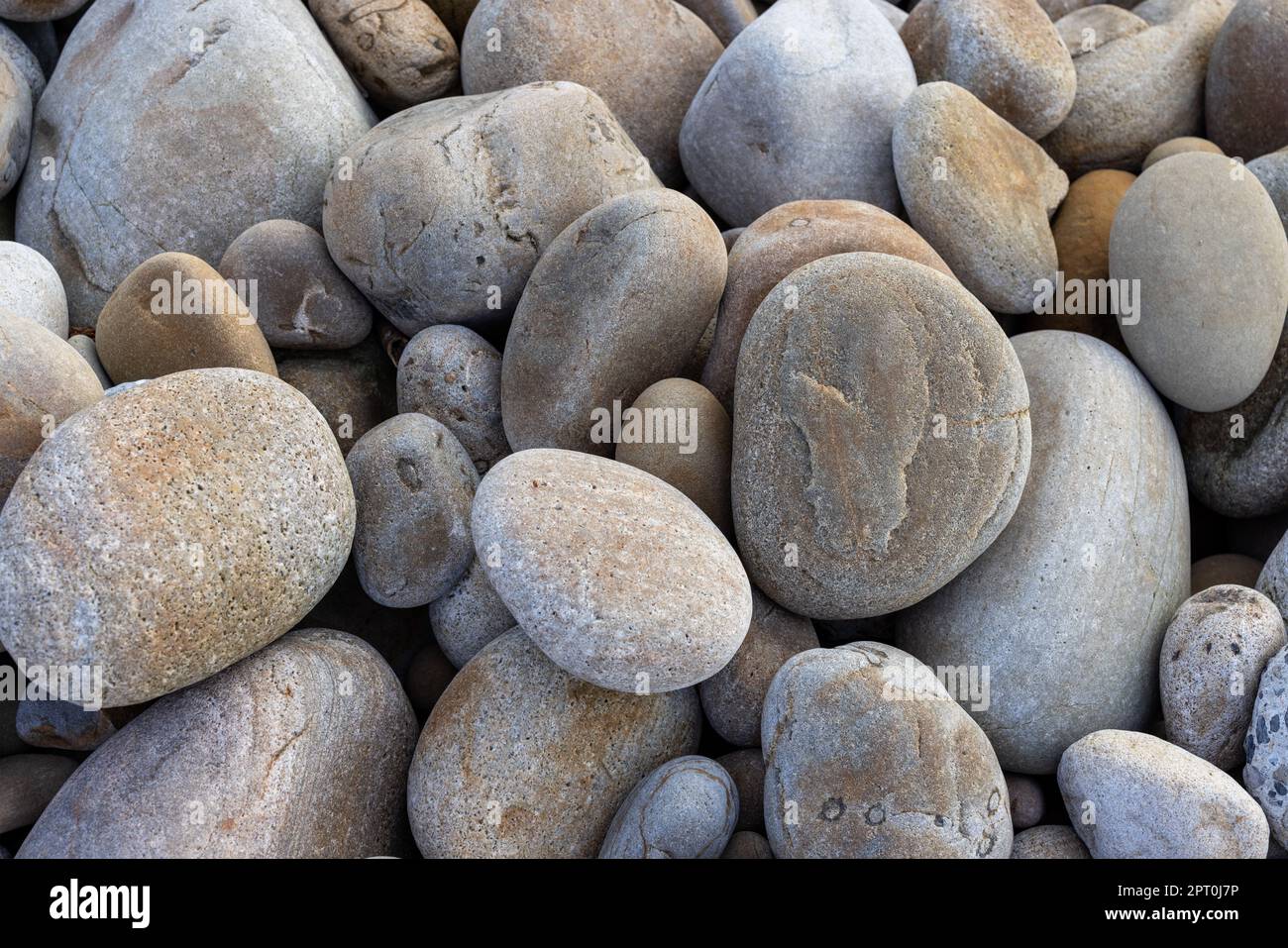 Pebble stone over the seaside Stock Photo - Alamy