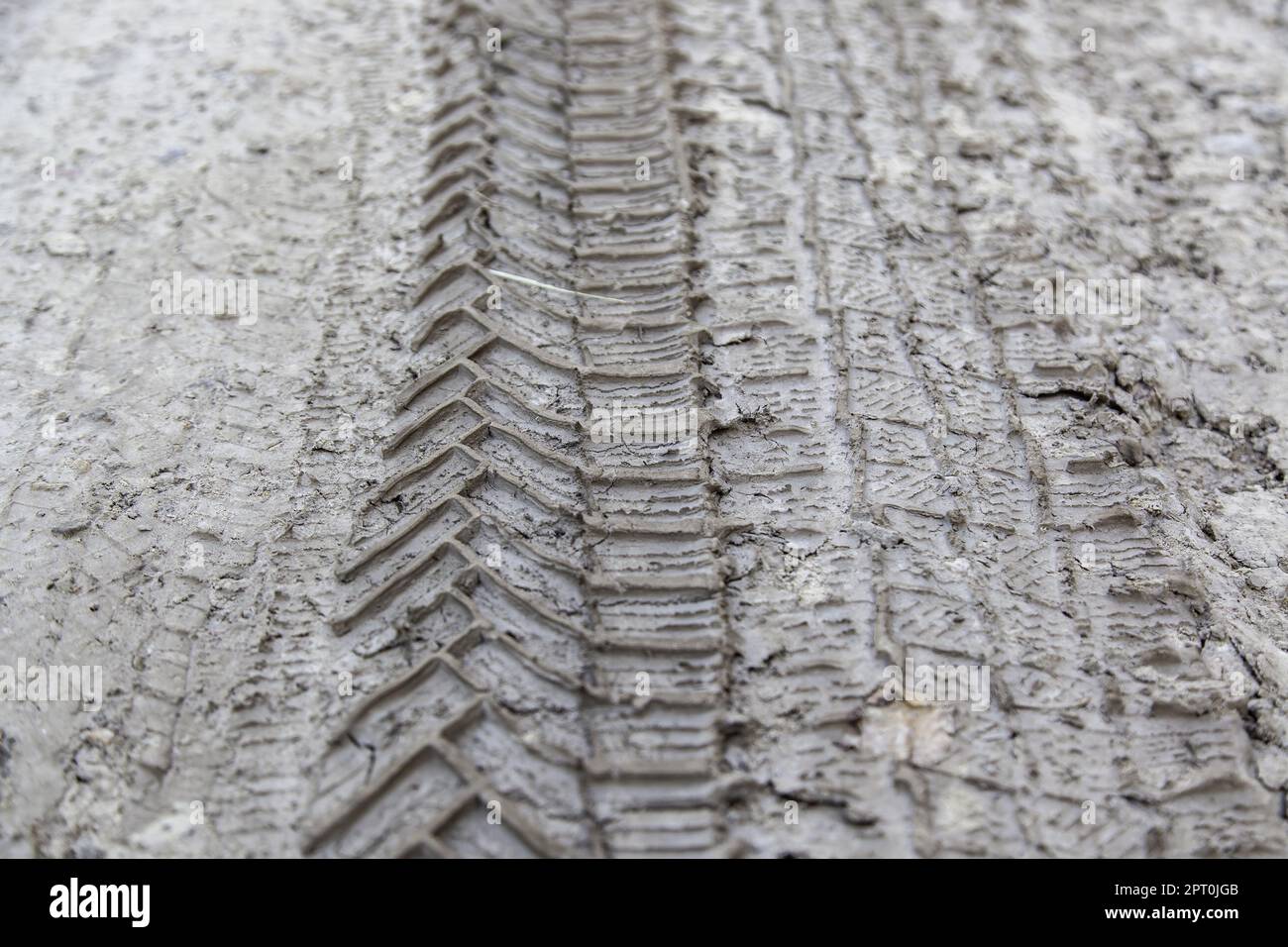 Detail of off-road car marks on a wet and muddy ground Stock Photo - Alamy