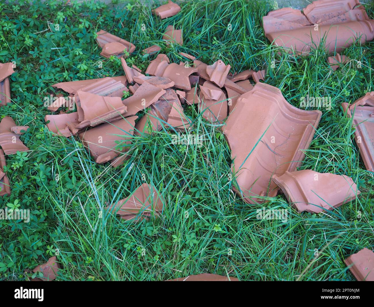 roof tiles damaged by gale wind during hurricane Stock Photo - Alamy