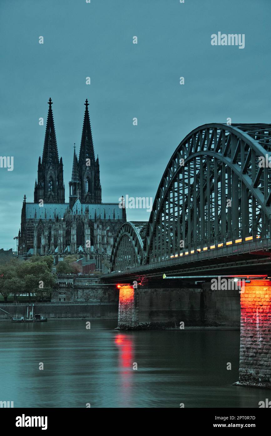 Cologne Cathedral and the Hohenzollern Bridge at dusk Stock Photo - Alamy