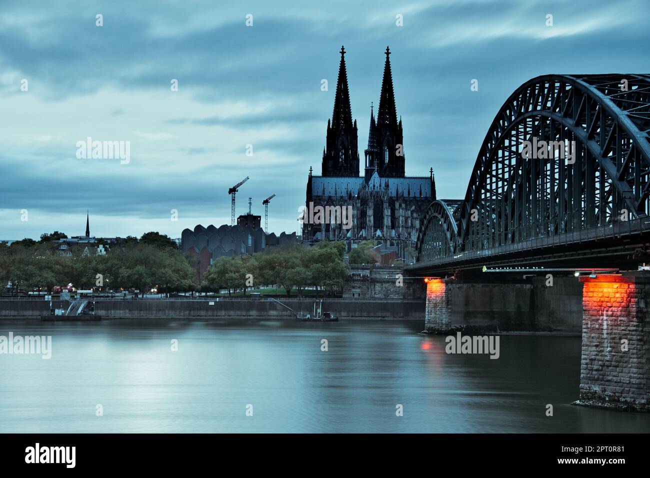 Cologne Cathedral and the Hohenzollern Bridge at dusk Stock Photo - Alamy