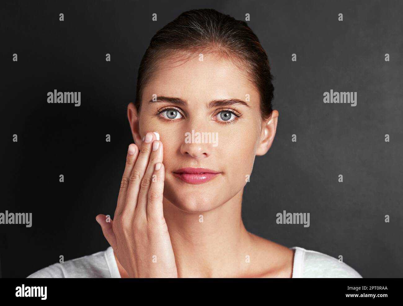 I look after my skin. Studio portrait of an attractive young woman ...