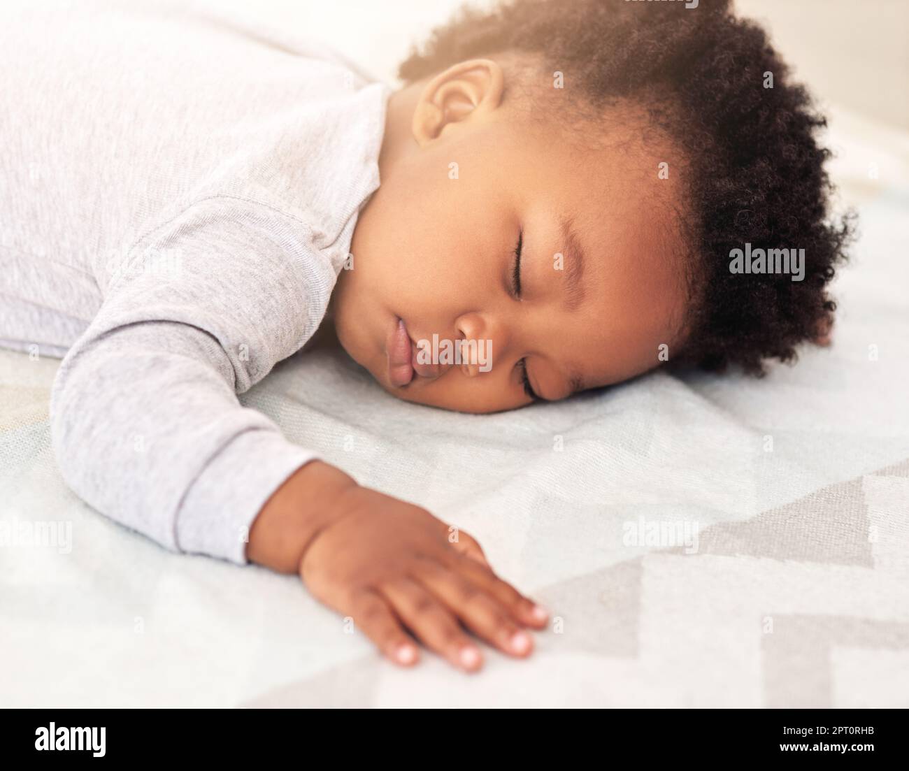 African american child sleeping alone hi-res stock photography and ...