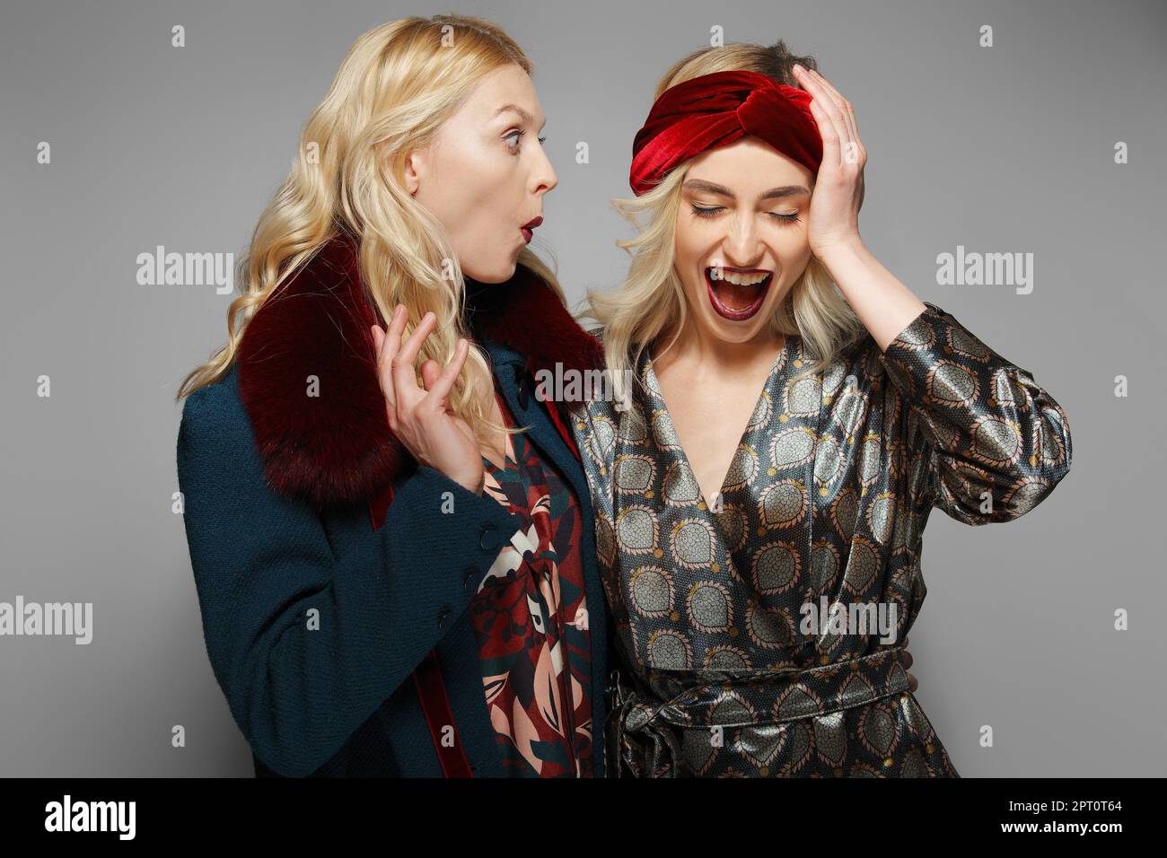 Two happy girls emotionally twitching. Expressing the emotions., Two ...