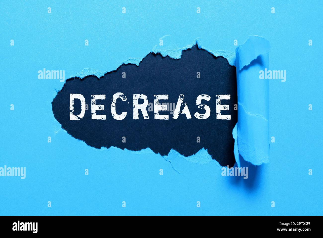 Hand writing sign Decrease, Internet Concept make or become smaller or fewer in size amount ...