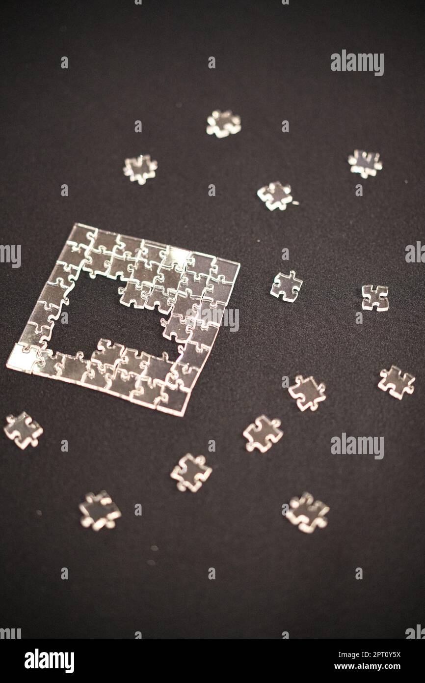 Transparent puzzle pieces hi-res stock photography and images - Alamy