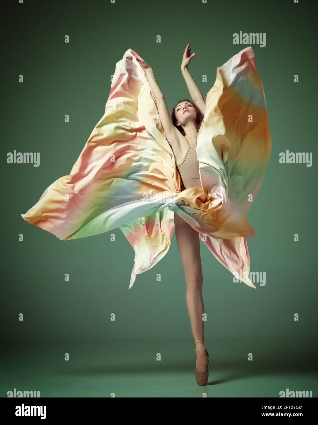 Portrait of young ballerina, ballet dancer wearing colorful dress ...