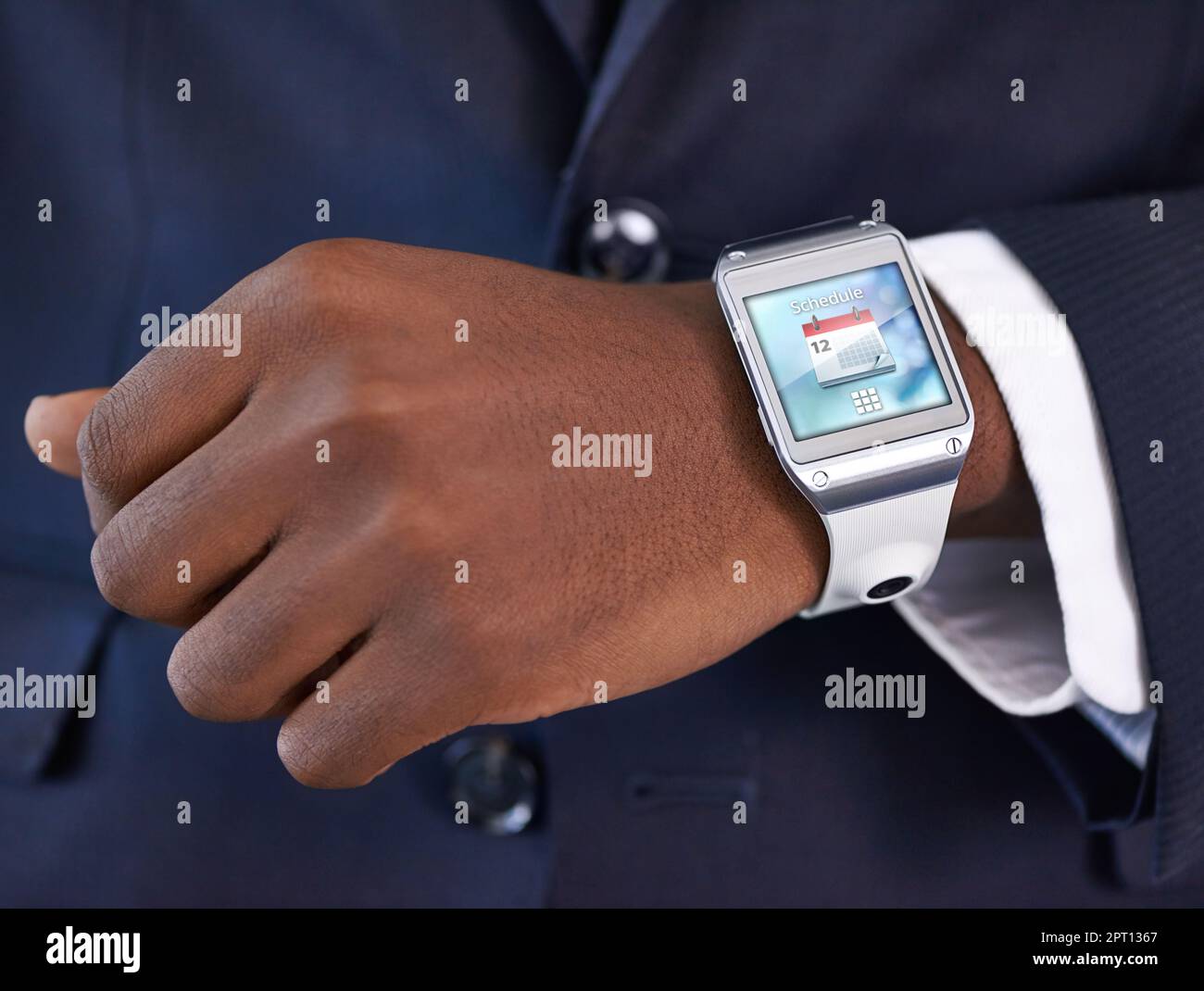 Time in the modern age. Cropped view of a young businessman wearing a ...