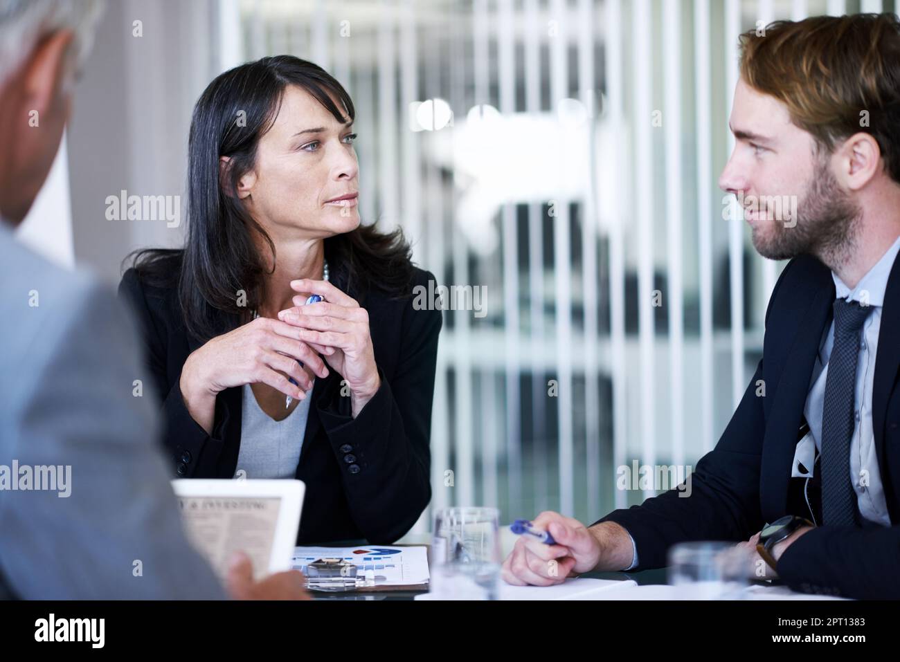 Getting the job done with teamwork. a group of business colleagues ...