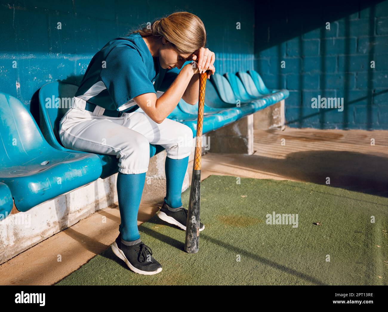 Baseball, sports bench and woman athlete angry thinking of game loss ...