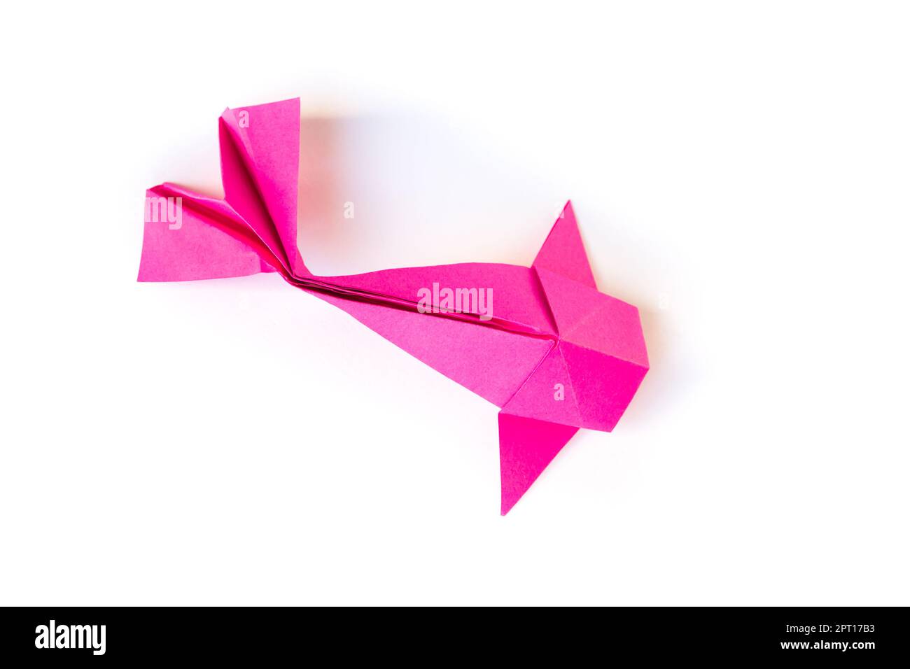Pink paper fish origami isolated on a blank white background Stock ...
