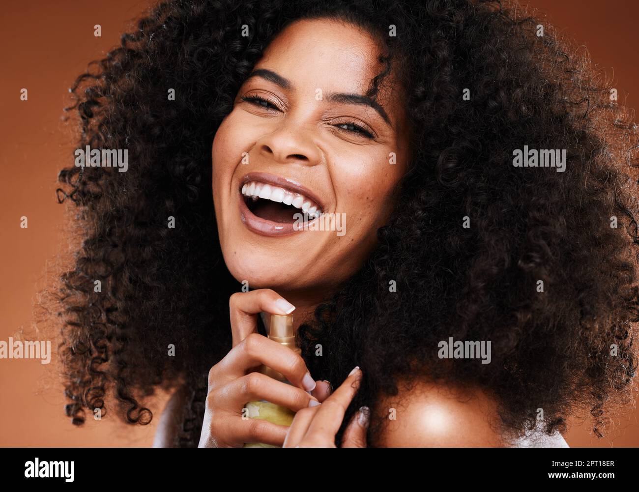 Hair care, spray and portrait of a black woman with an afro doing a ...