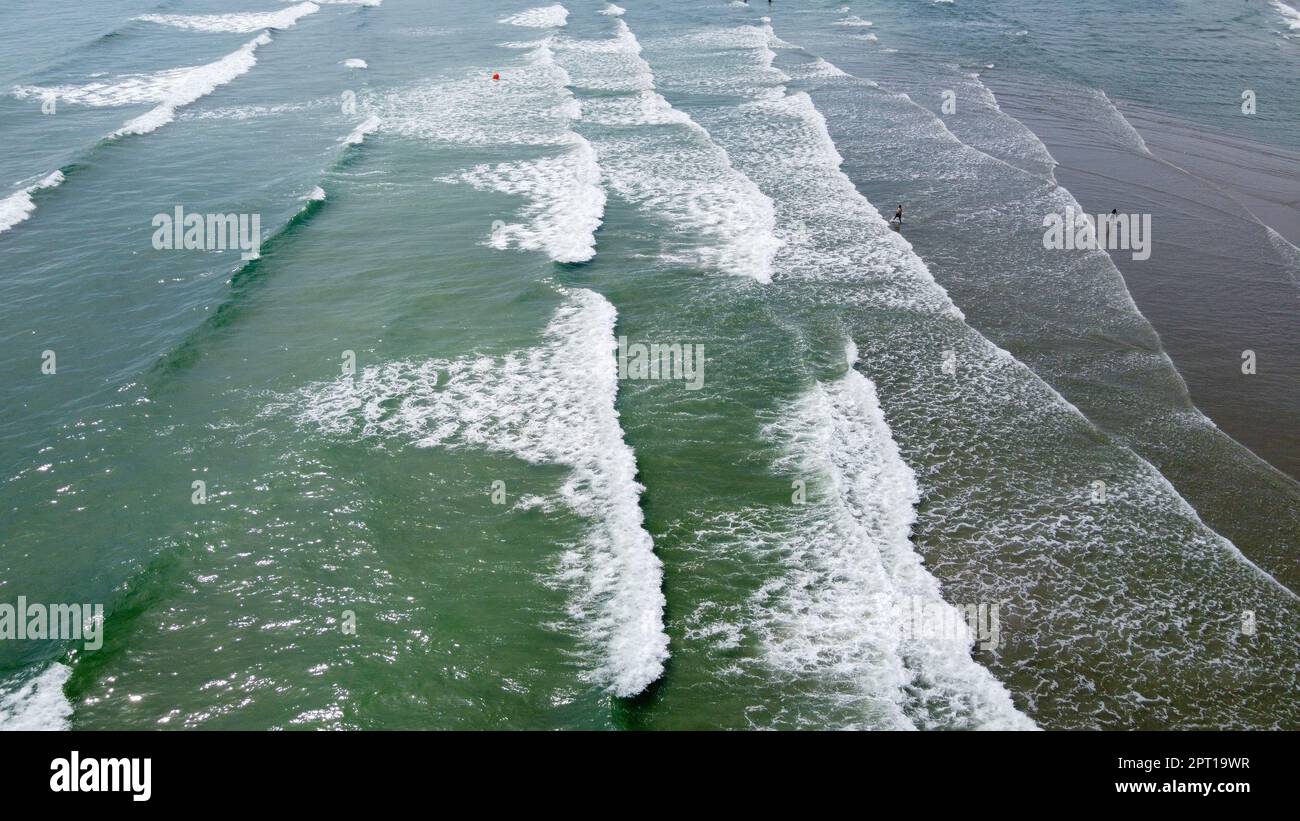 Waves of the sea tide, top view. White sea foam on the surface of the ...