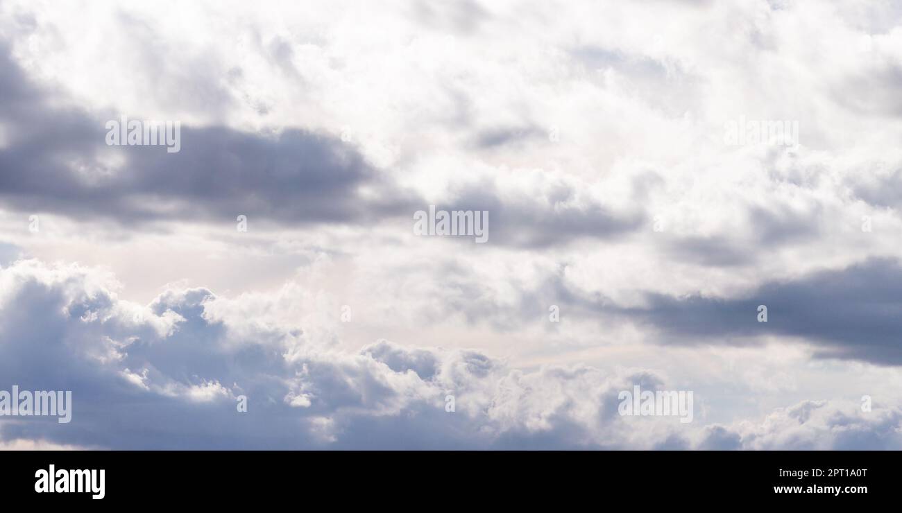 Gray cumulus clouds in the sky. Dramatic skies, landscape. The sky is ...