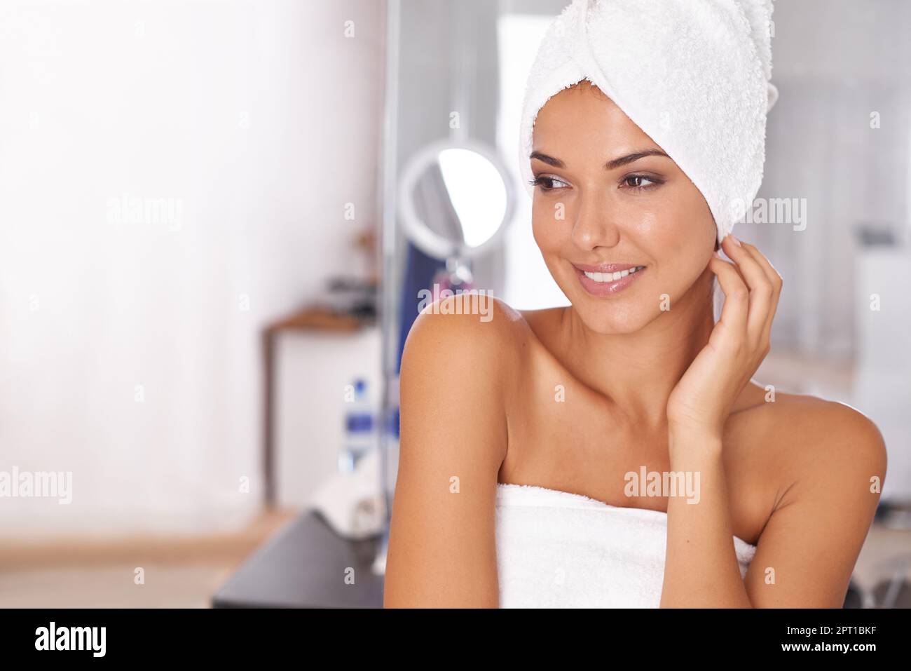 Feeling ready for the day after that shower. a beautiful young woman ...