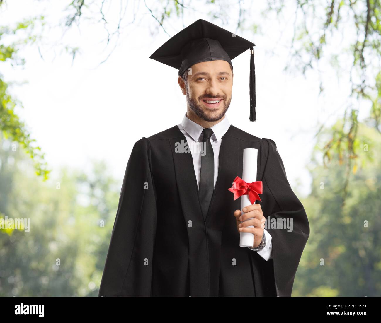 Male college graduate posing outdoors hi-res stock photography and ...