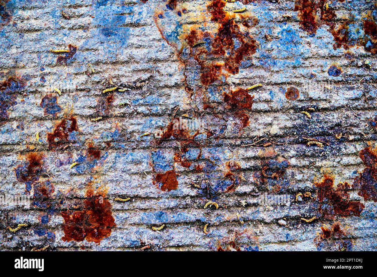 Detailed close up surface of rusty metal and stone with lots of ...