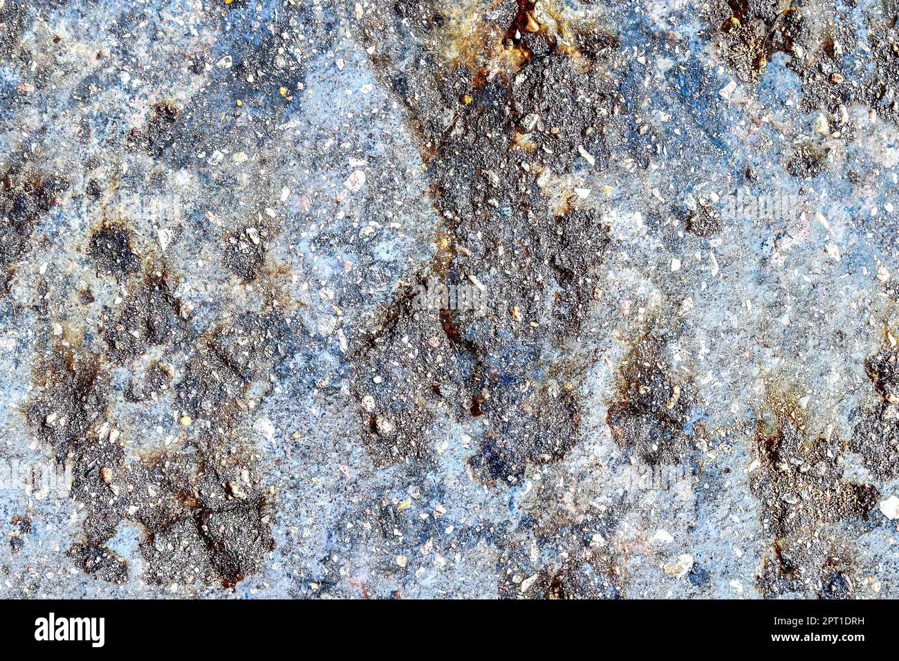 Detailed close up surface of rusty metal and stone with lots of ...