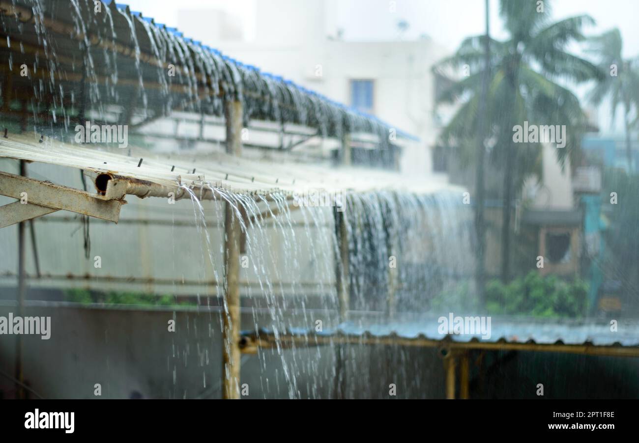 Rain on a Tin Roof. Rain Falling from the Roof. Rainy day nature ...