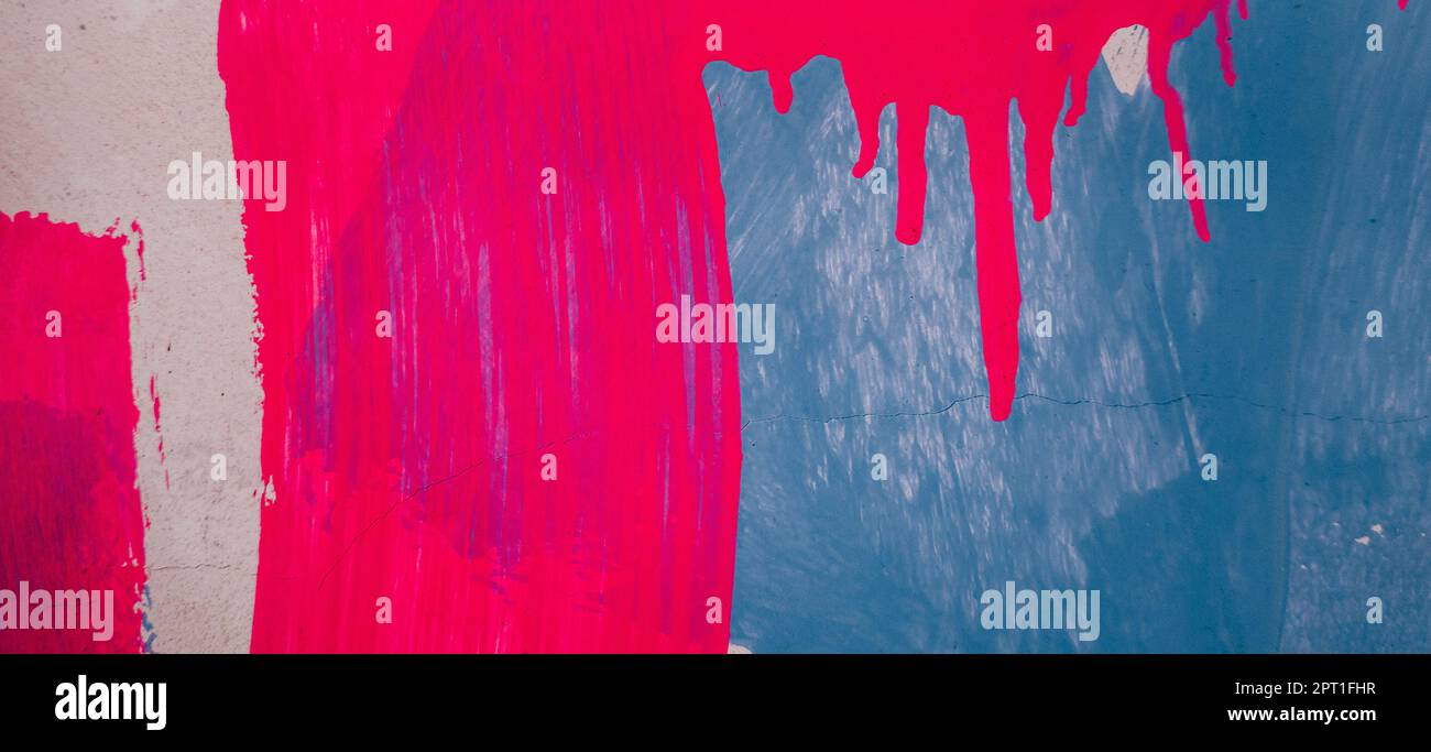 Messy paint strokes and smudges on an old painted wall background ...