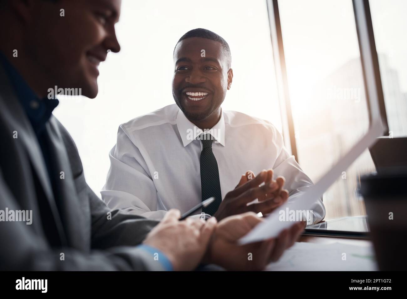 Well reach great places with this plan. two businessmen going through ...