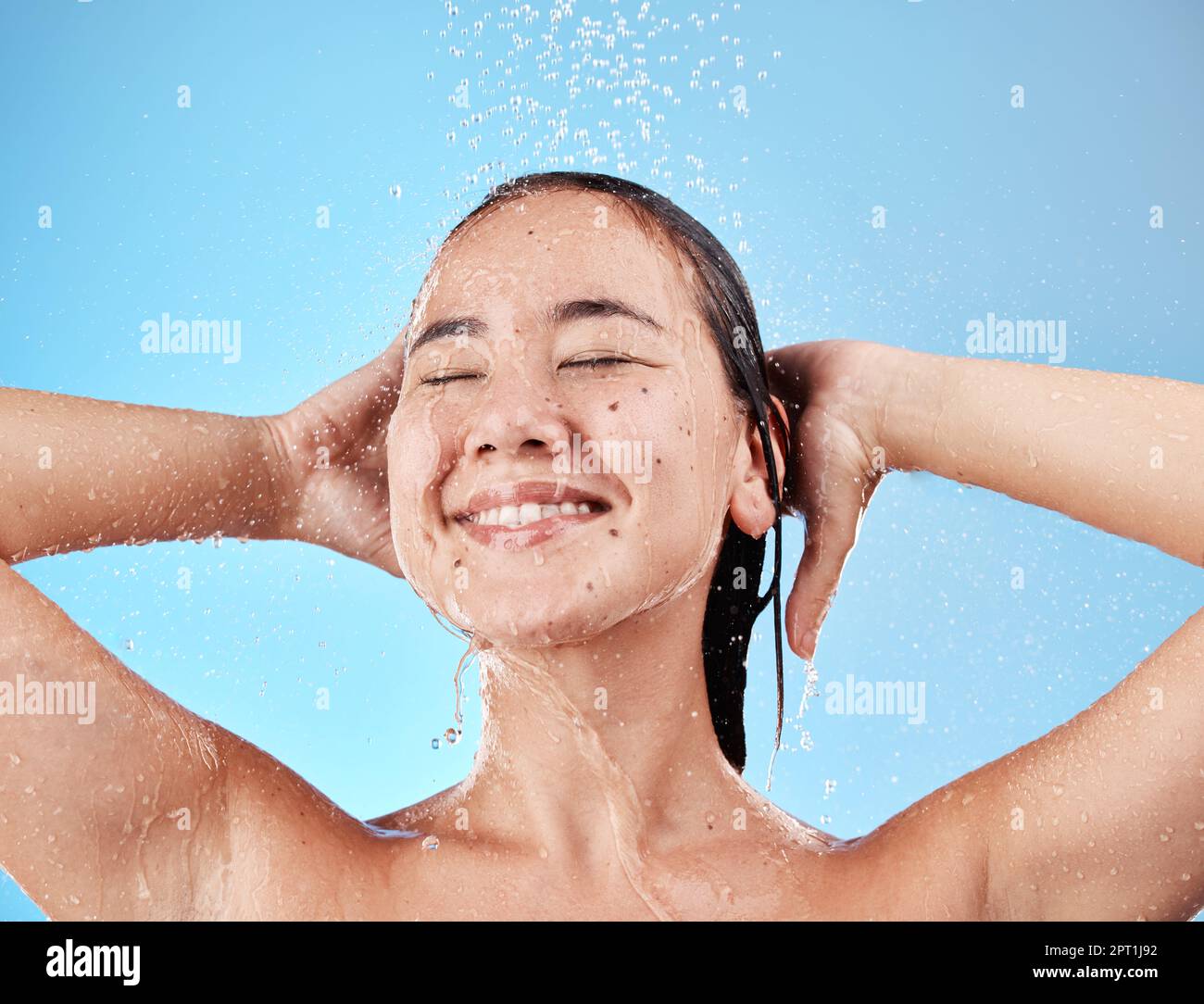 Woman, shower and smile in skincare for hygiene, hydration or water ...