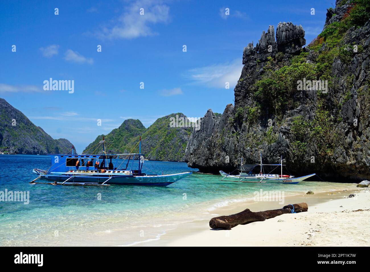 wooden traditional outrigger boats on palawan island at the philippines ...