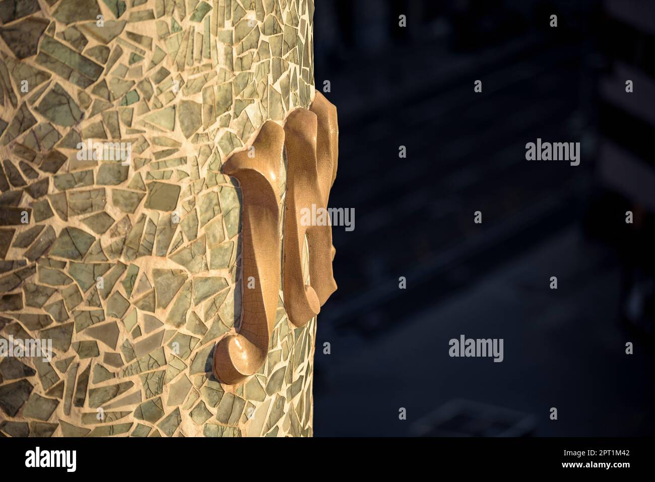 Base of the cross that crowns the facade of Casa Batlló decorated with ...