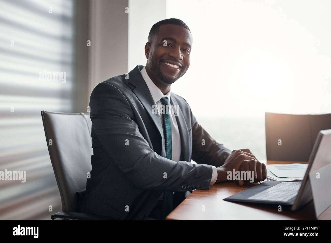 Business is good. Cropped portrait of a handsome businessman working in ...