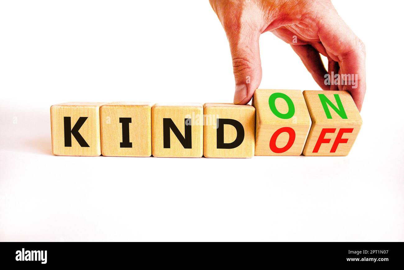 Kind on or off symbol. Businessman turns wooden cubes and changes word ...