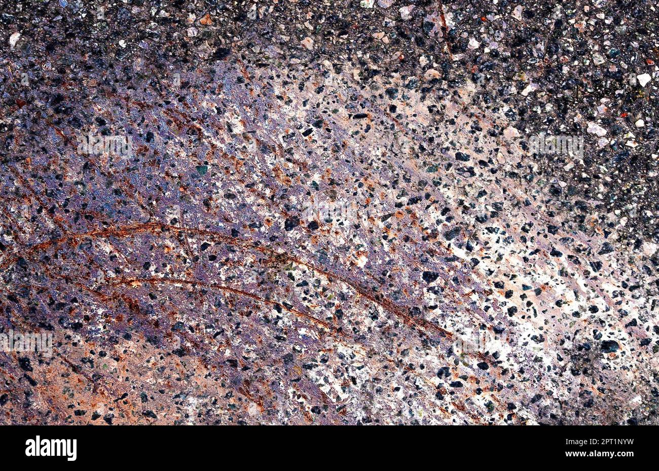 Detailed close up surface of rusty metal and stone with lots of ...