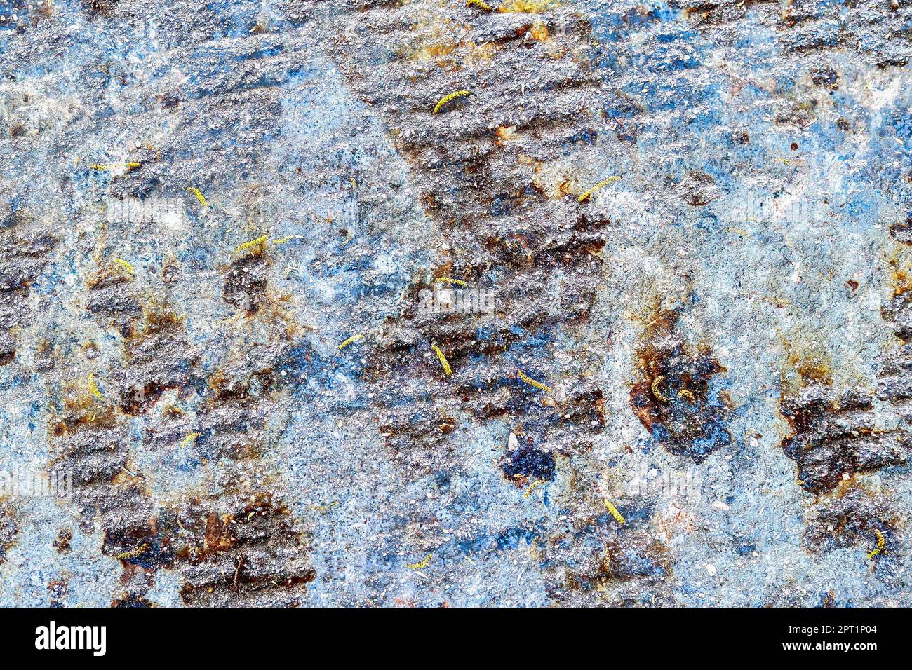 Detailed close up surface of rusty metal and stone with lots of ...