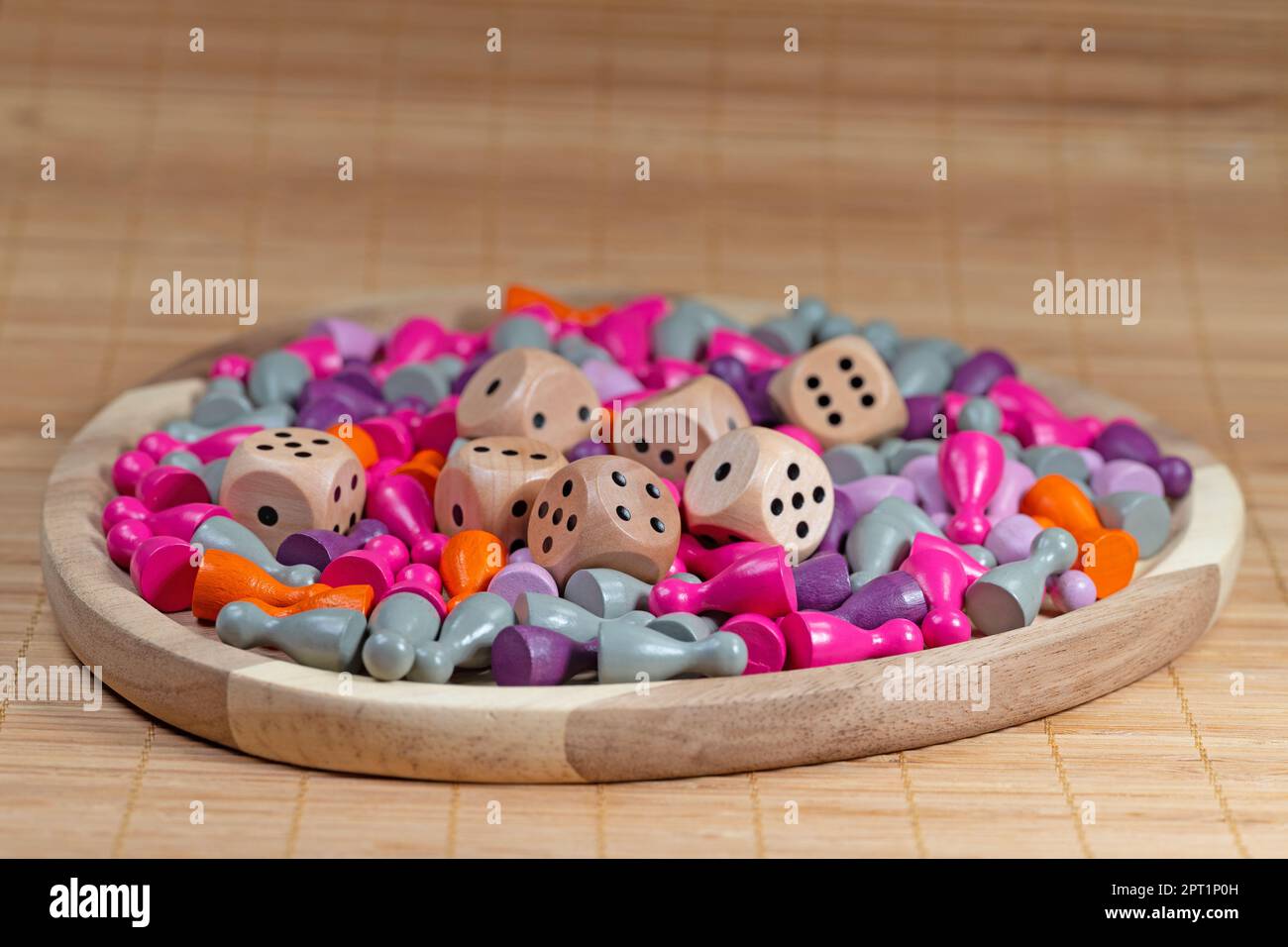 Many colorful game pieces and dice for board games Stock Photo - Alamy