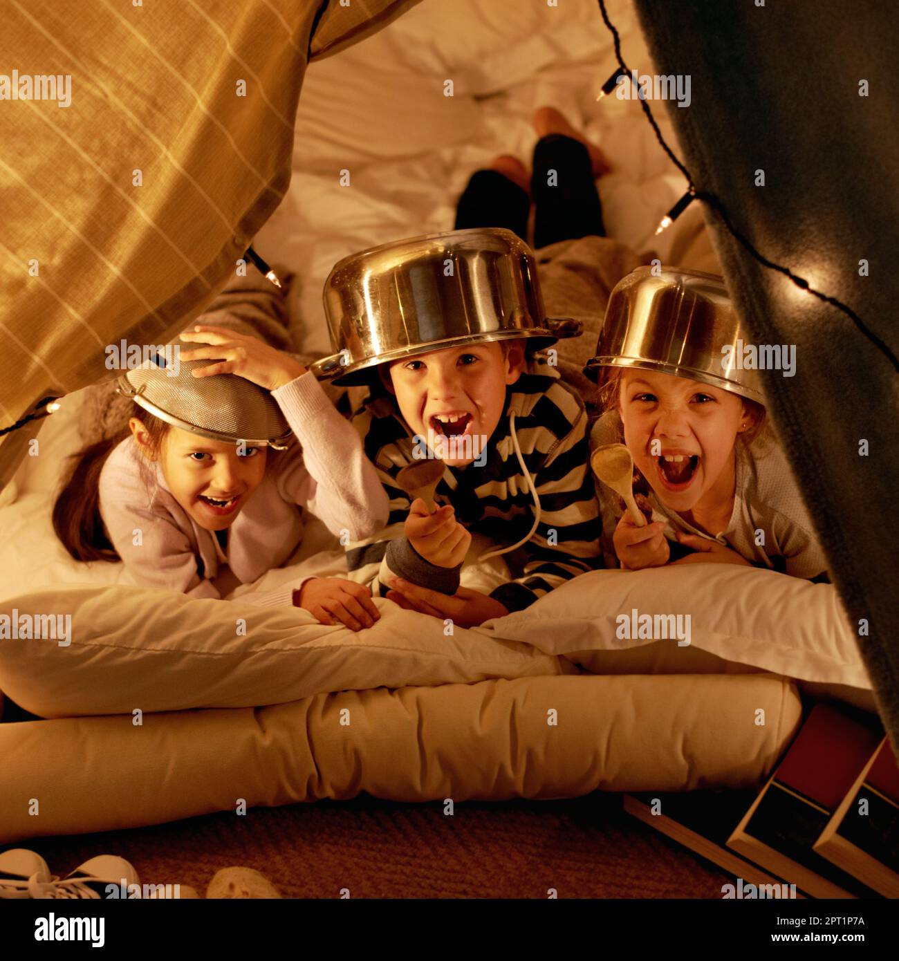 Youll never take us. cute little children with pot helmets in a blanket ...